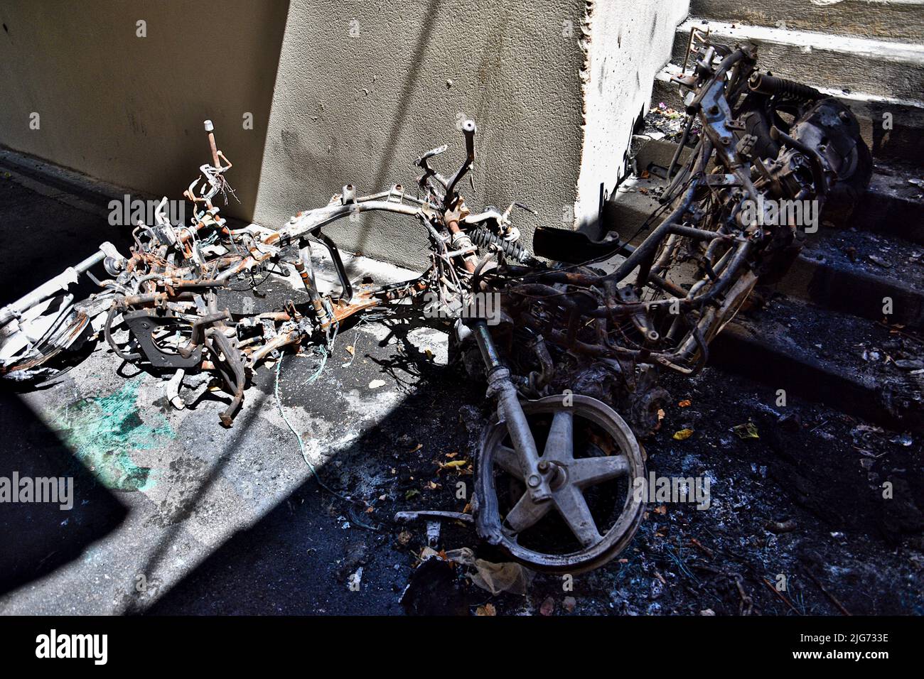 View of a burnt scooter bike that thieves used fire to erase their ...