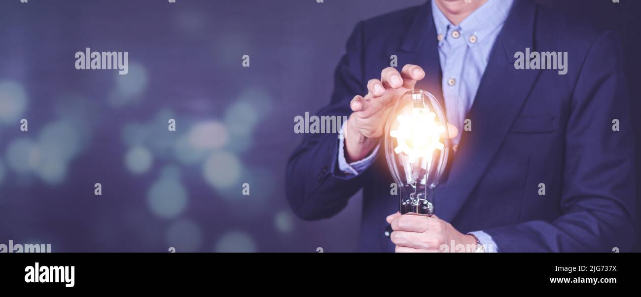 Innovation. Hands holding light bulb for Concept new idea concept with innovation and ...