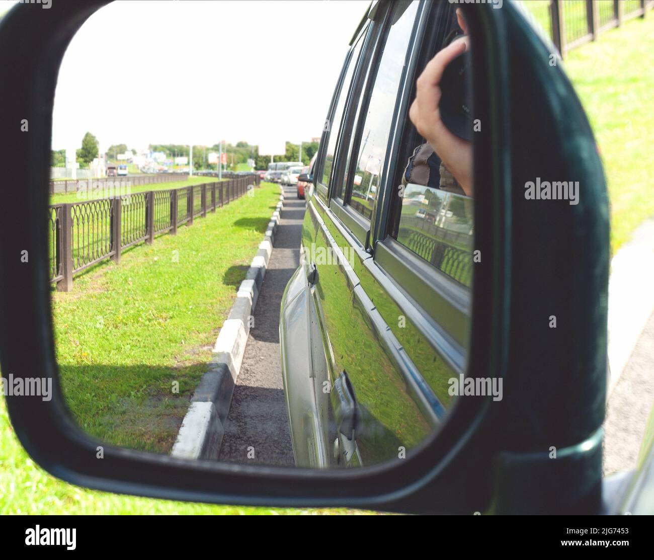 shooting through the SUV rear view mirror Stock Photo - Alamy