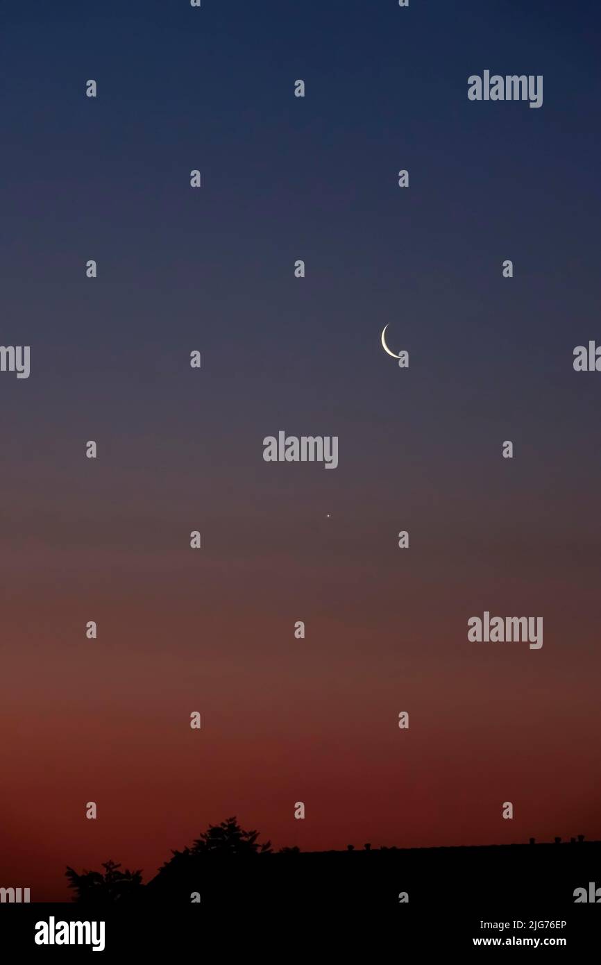 Crescent moon, summer evening, Germany Stock Photo - Alamy