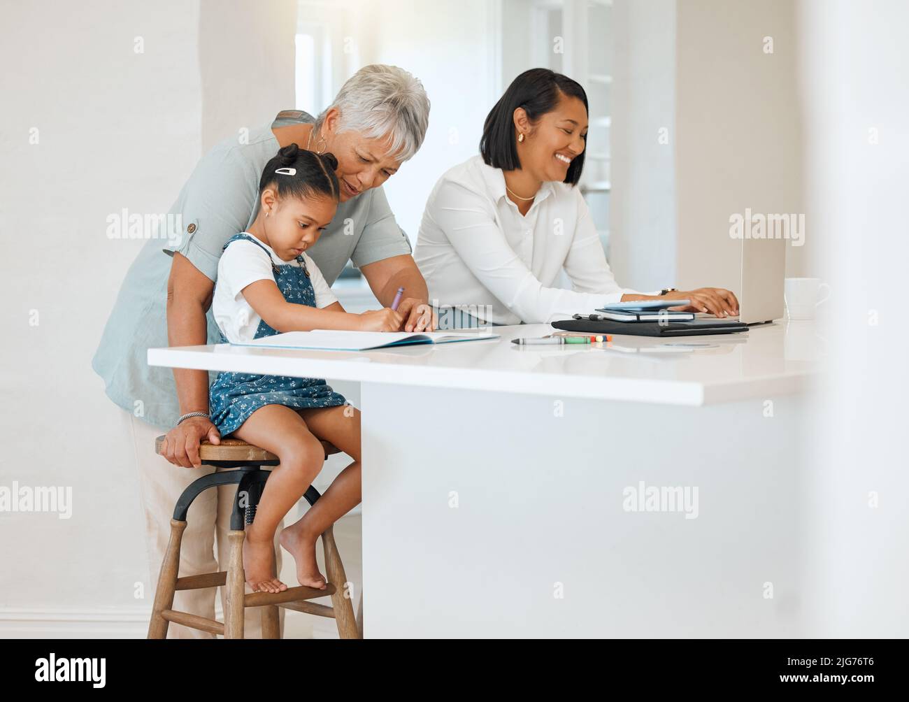 Youre as smart as your mom was. Shot of a young girl getting help from ...