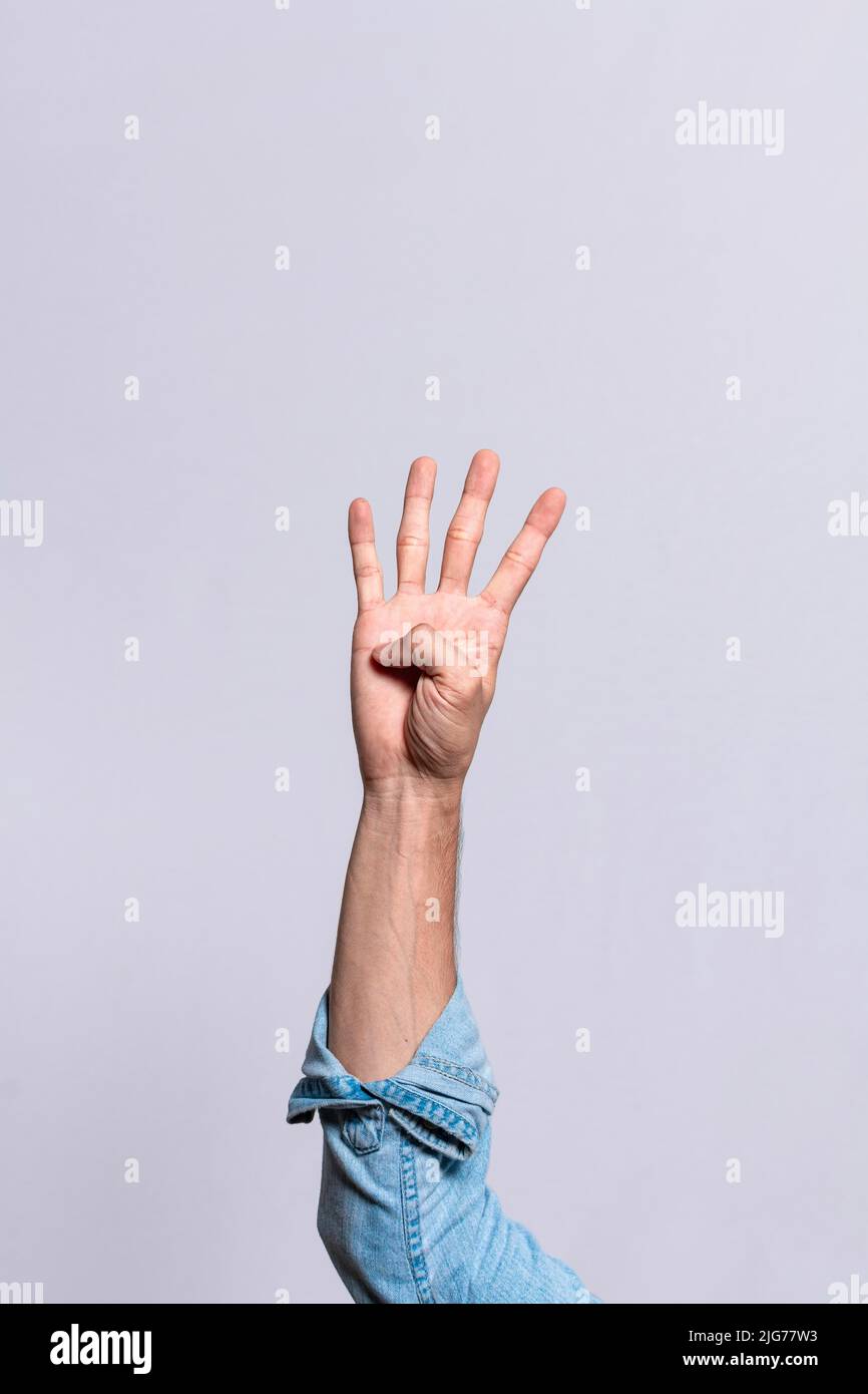 Hand counting number four, Man hand showing number four, Guy finger ...