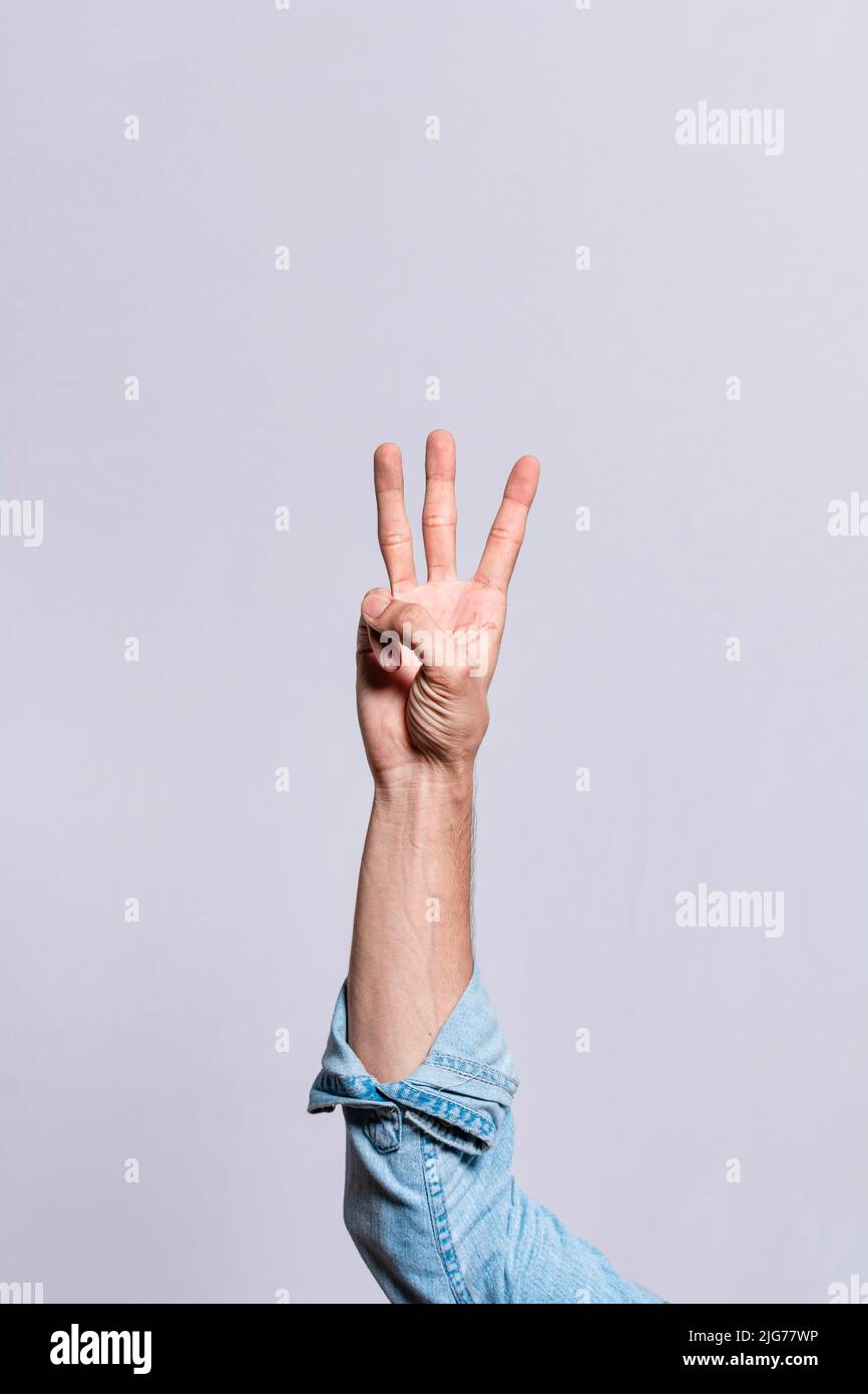 Hand counting number three, Man hand showing number three, Guy finger ...