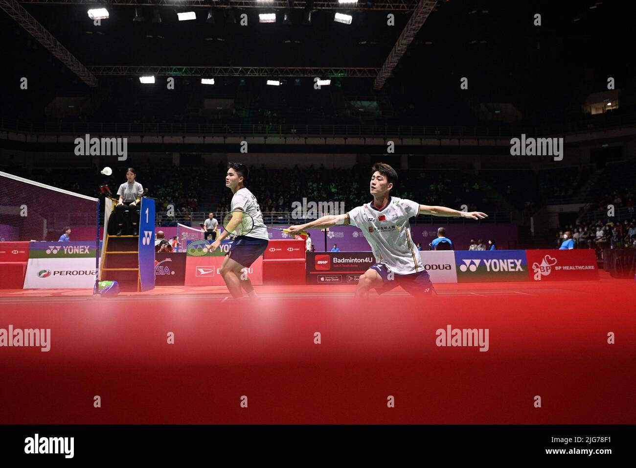 Kuala Lumpur, Malaysia. 8th July, 2022. China's Liang Weikeng (L)/Wang Chang compete during the ...