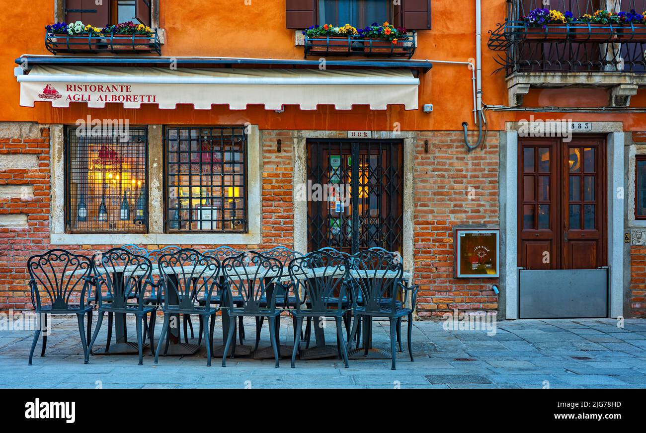 Restaurant with typical Venetian house facade in the lagoon city of ...