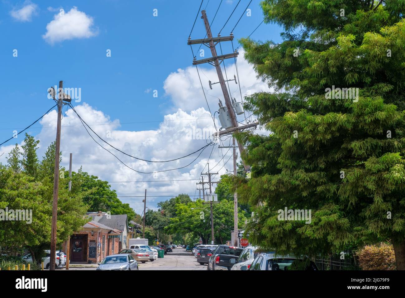 NEW ORLEANS, LA, USA - JULY 2, 2022: Severely leaning utility pole in ...