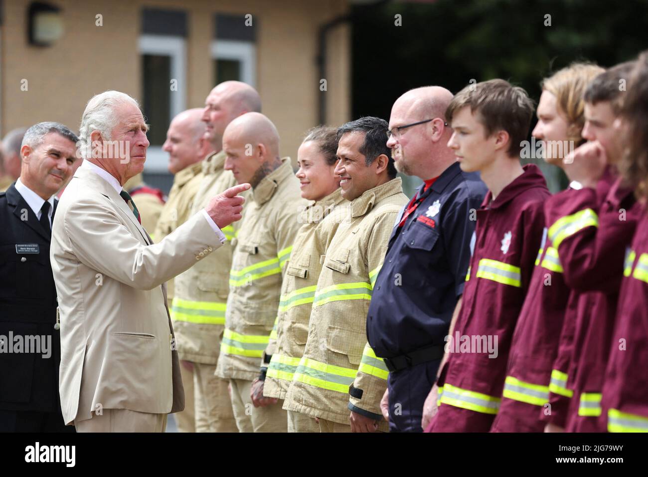 The Prince of Wales meeting firefighters during a visit to Morecambe ...