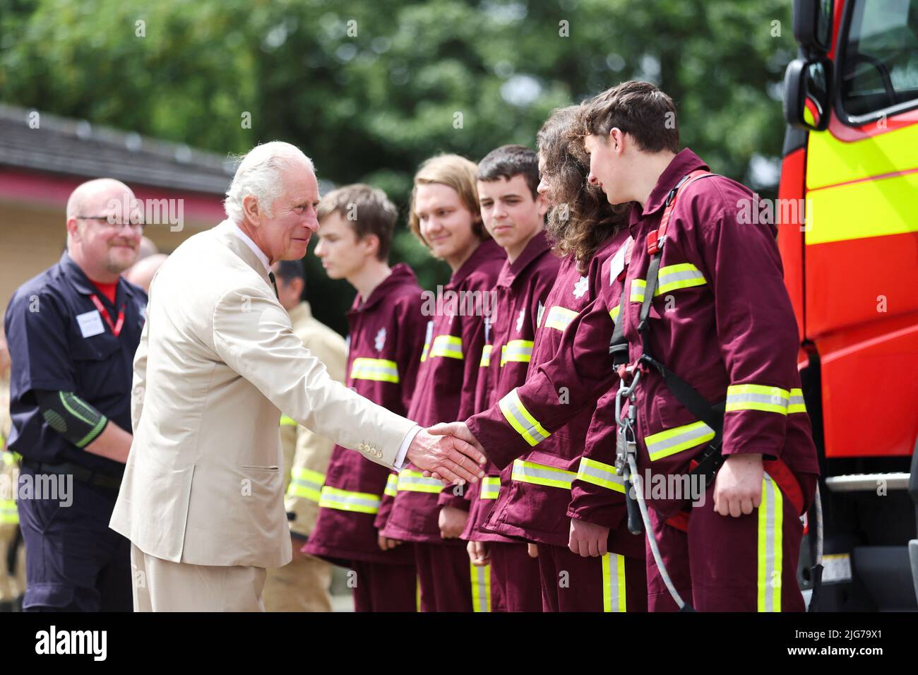 The Prince of Wales meeting firefighters during a visit to Morecambe ...