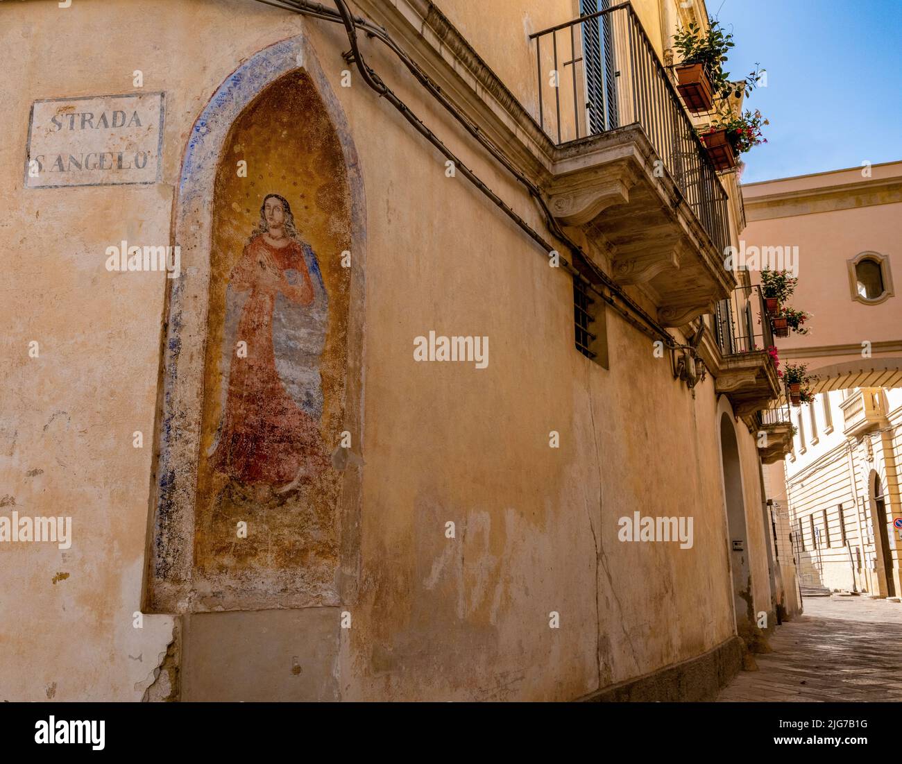 Street scene in the Old City of Nardo, Puglia with a cutout of the ...
