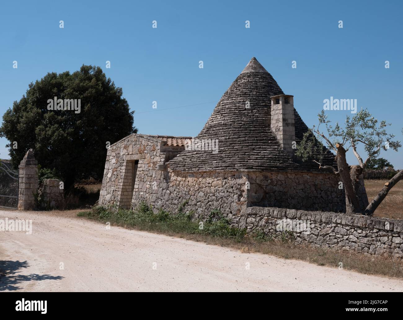 Trulli houses of Alberobello region of Puglia with conical roofs ...