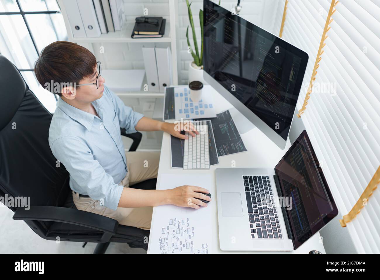 Software development concept, Male programmer typing data code on ... Software development concept, Male programmer typing data code on ...