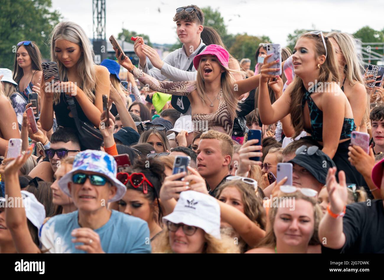 Festival-goers watch Ella Henderson perform on the main stage on the ...