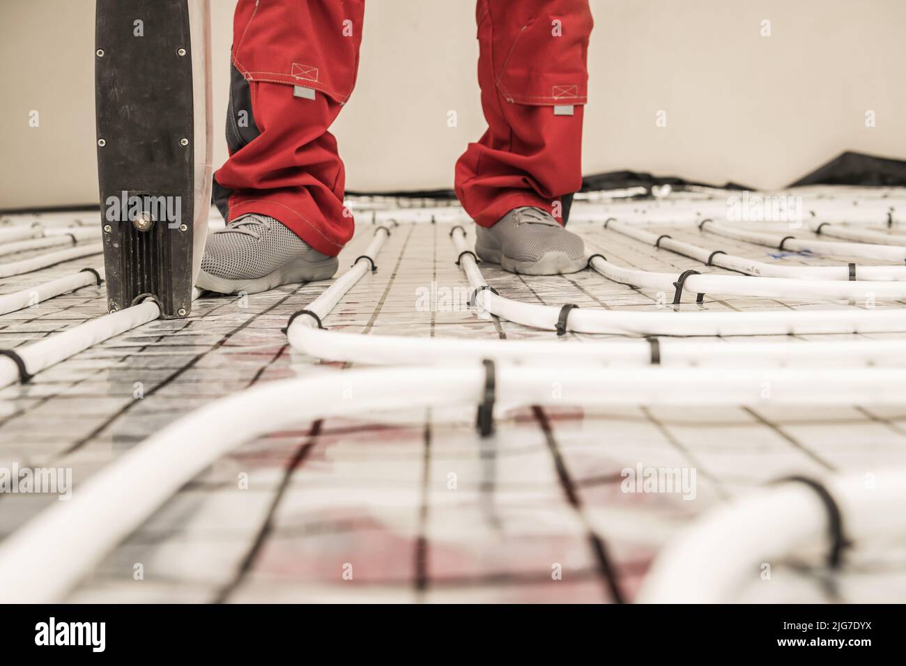 Radiant Floor Heating Pipe Installation Performed by Professional HVAC ...