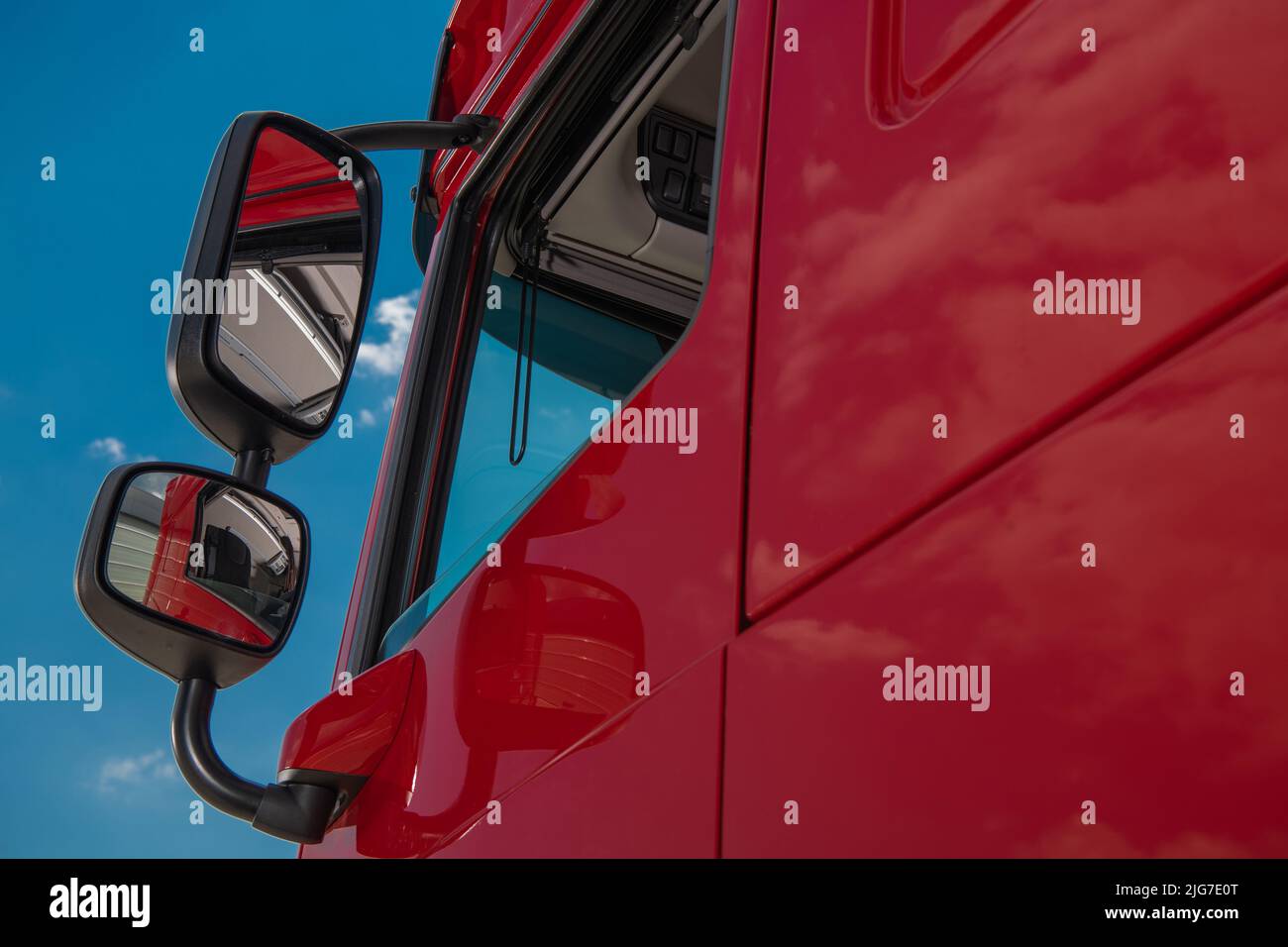Red Modern Euro Semi Truck Tractor and the Clear Blue Sky. Heavy ...