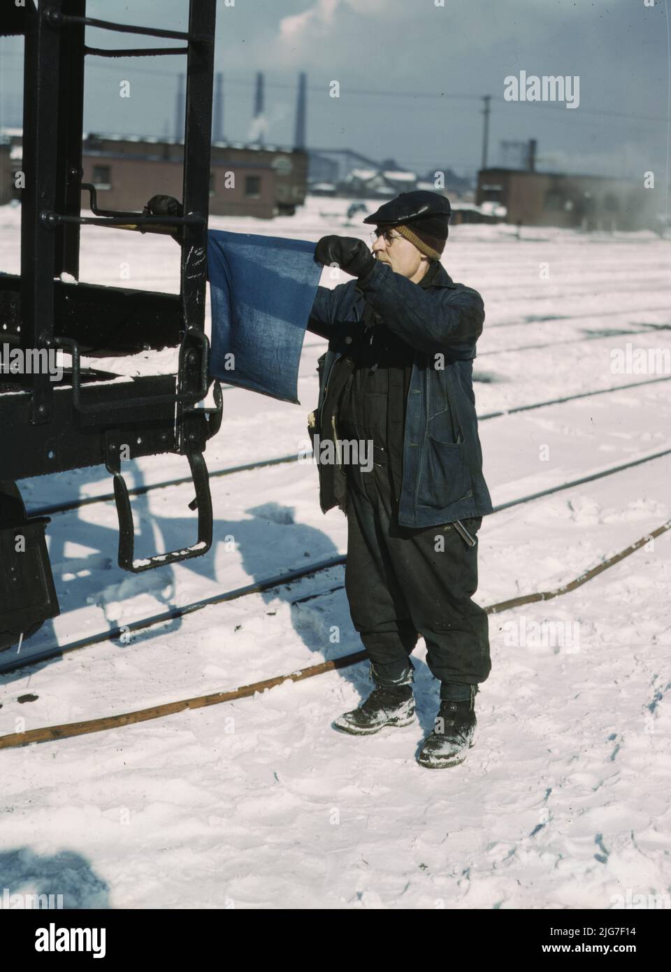 John Paulinski, car inspector, blue flagging a train for inspection, at ...