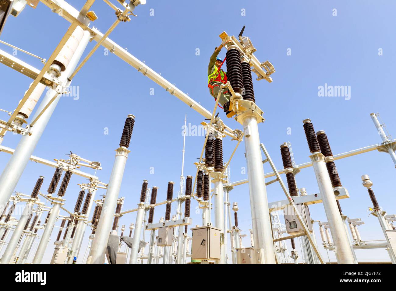 ZHANGYE, CHINA - JULY 7, 2022 - Construction workers install substation ...