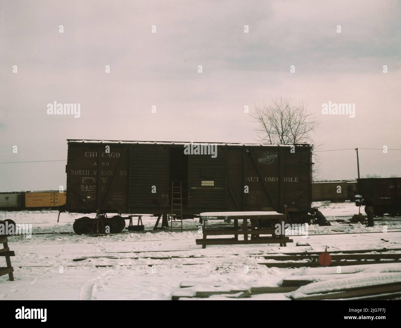 Car jacked up for repairs on the repair tracks, North Proviso, C & NW ...