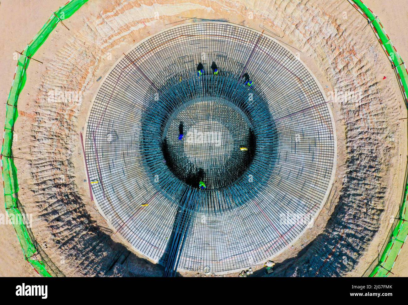 ZHANGYE, CHINA - JULY 7, 2022 - The construction site builders of the ...