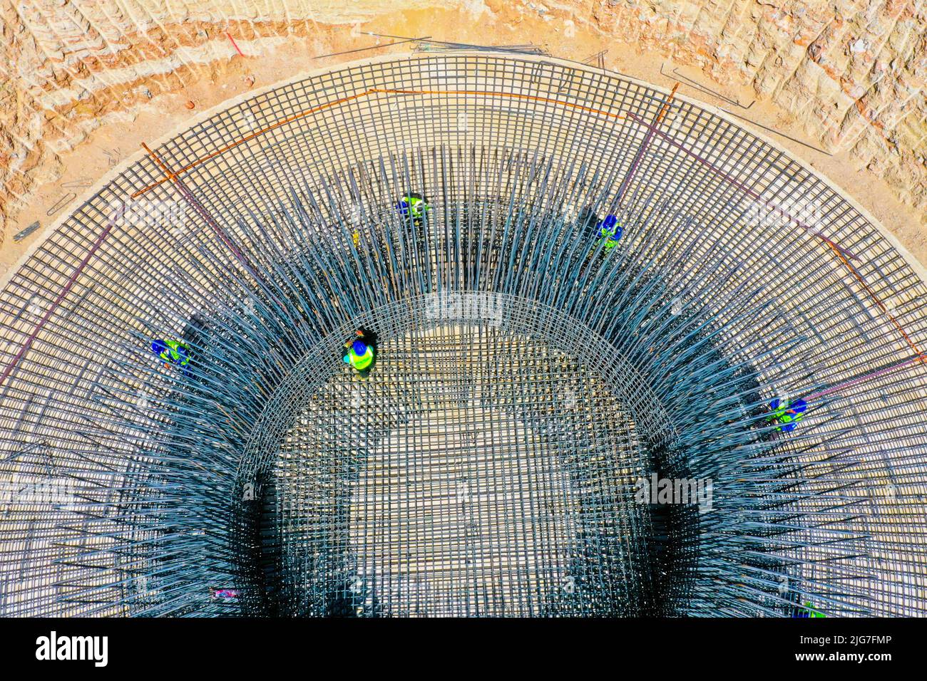 ZHANGYE, CHINA - JULY 7, 2022 - The construction site builders of the ...