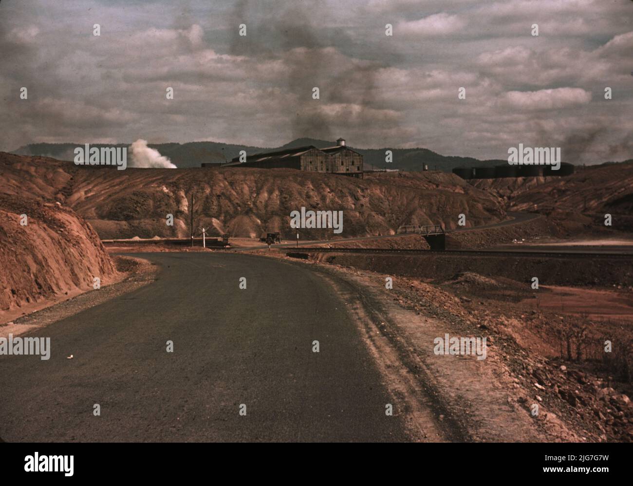 A train bringing copper ore out of the mine, Ducktown, Tennessee. Fumes ...
