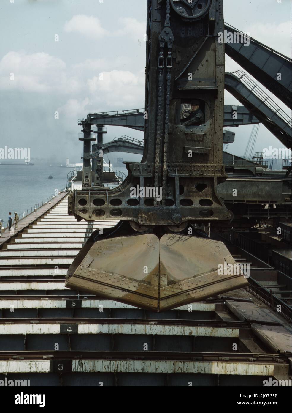 Pennsylvania R.R. ore docks, unloading iron ore from a lake freighter ...