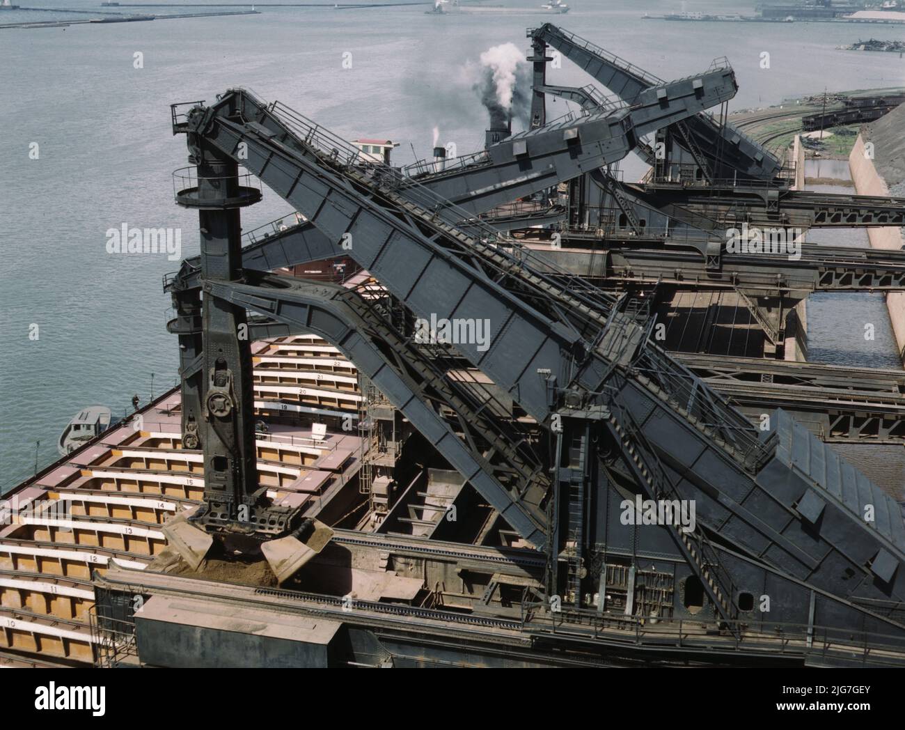Pennsylvania R.R. ore docks, unloading ore from a lake freighter by ...