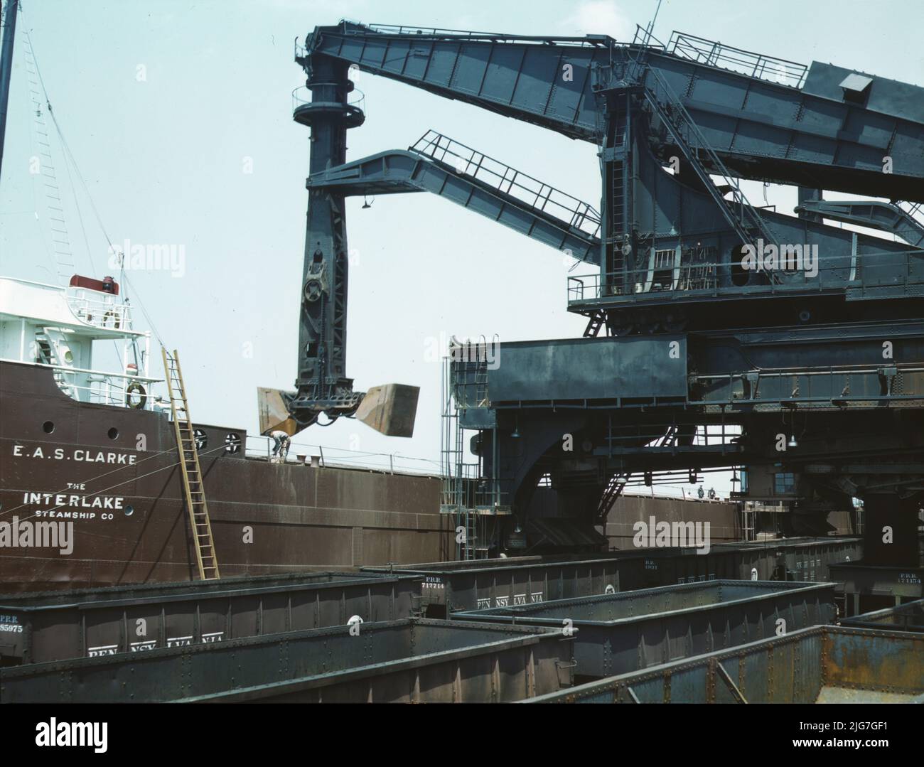 Pennsylvania R.R. ore docks, unloading ore from a lake freighter by ...