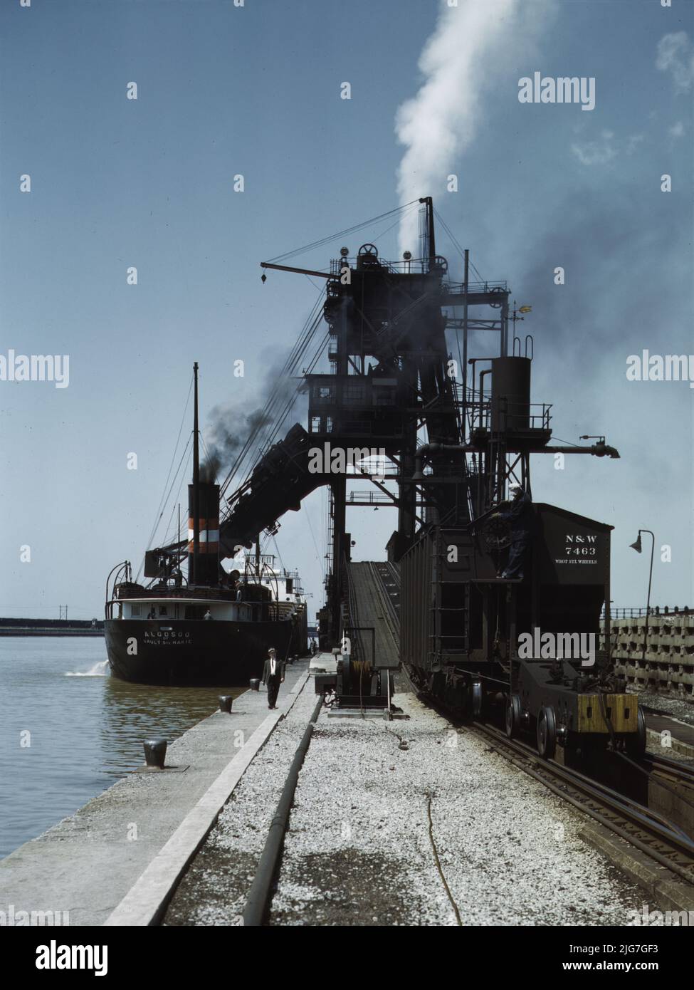 Loading a lake freighter with coal at the Pennsylvania R.R. coal docks ...