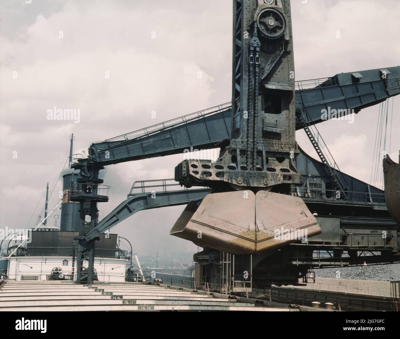 Pennsylvania R.R. ore docks, unloading iron ore from a lake freighter ...