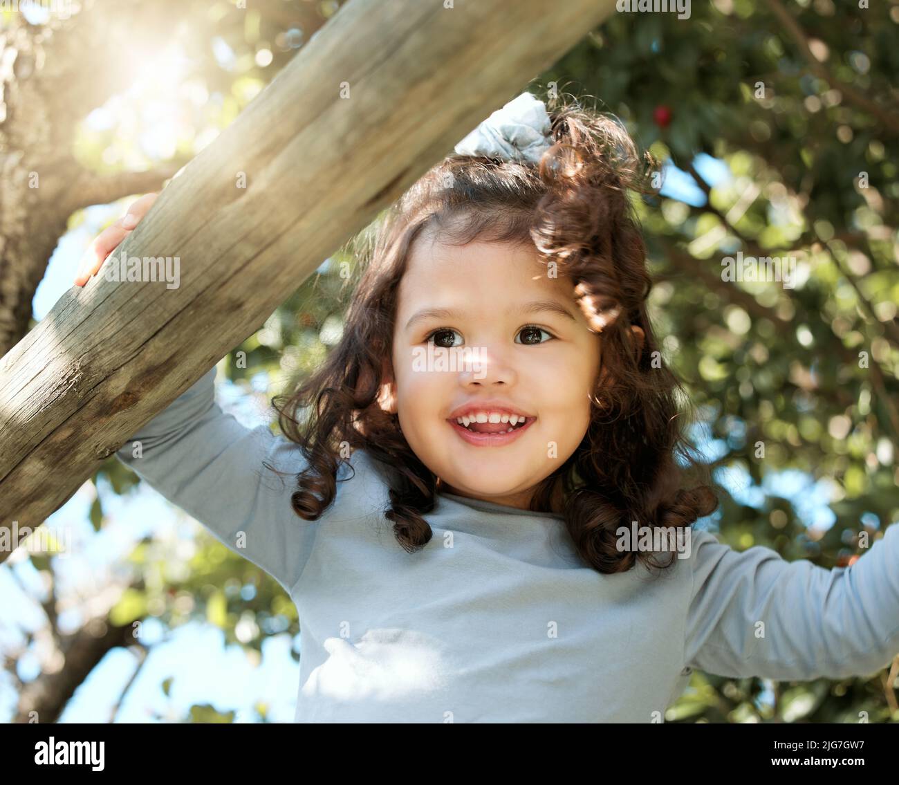 Child playing alone outside hi-res stock photography and images - Alamy
