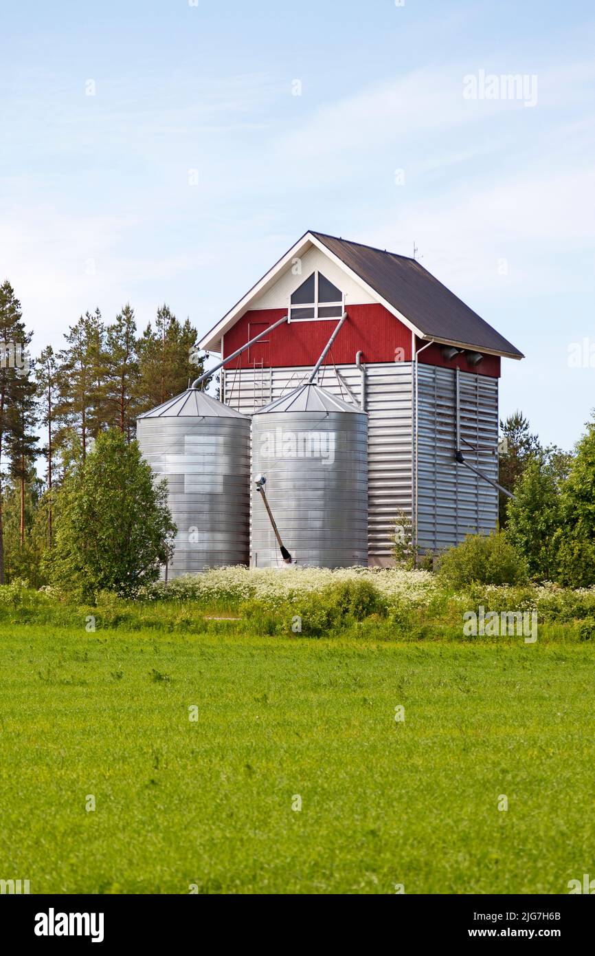 Harma, Finland - June 21, 2022: house with two silos connected Stock ...