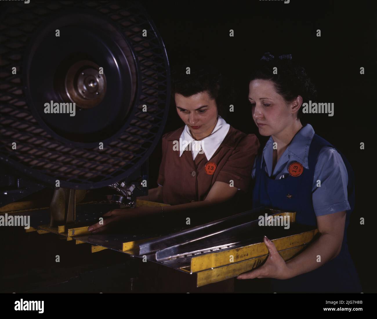 Punching rivet holes in a frame member for a B-25 bomber, the plant of ...