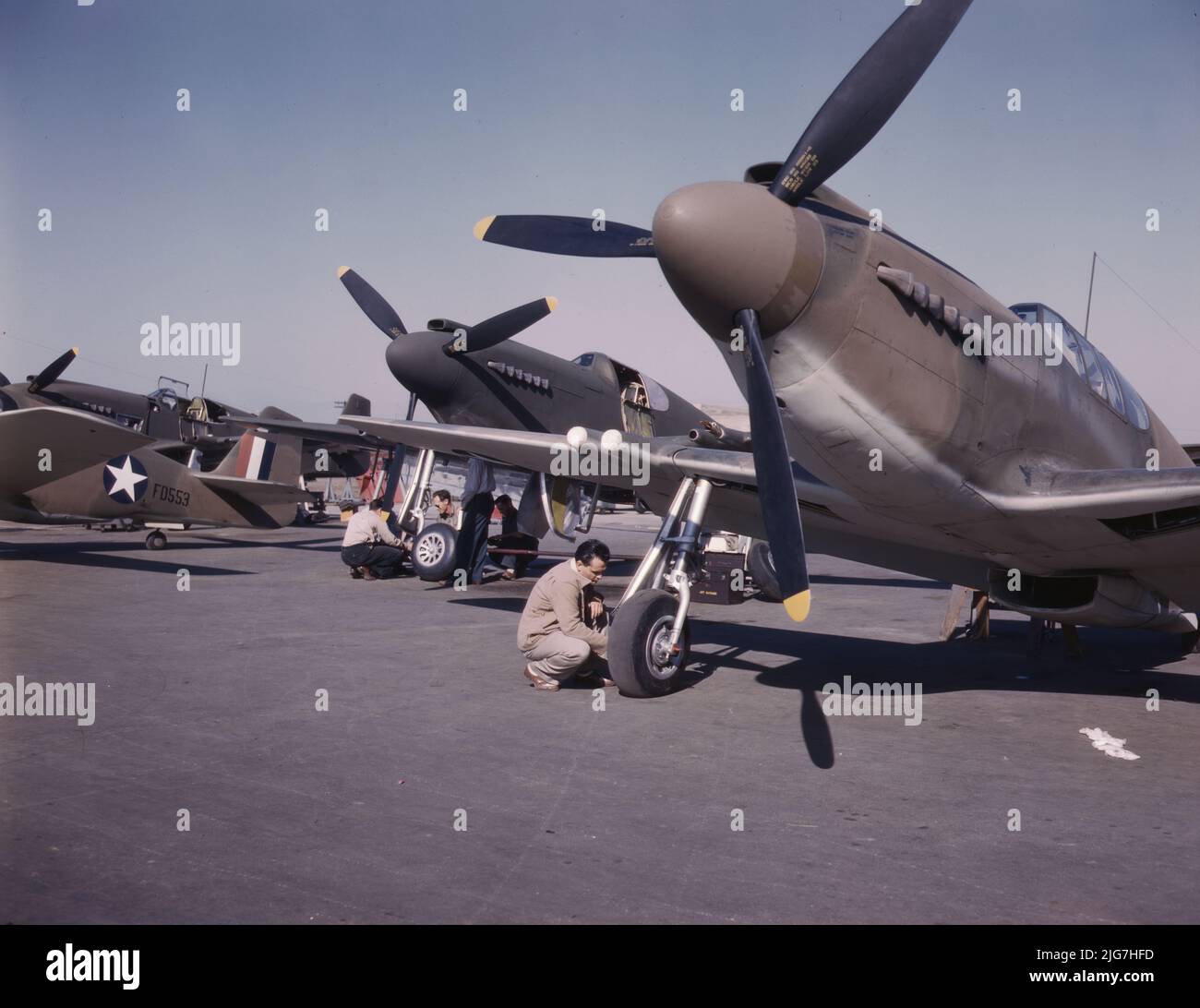 P-51 ("Mustang") fighter planes being prepared for test flight at the ...