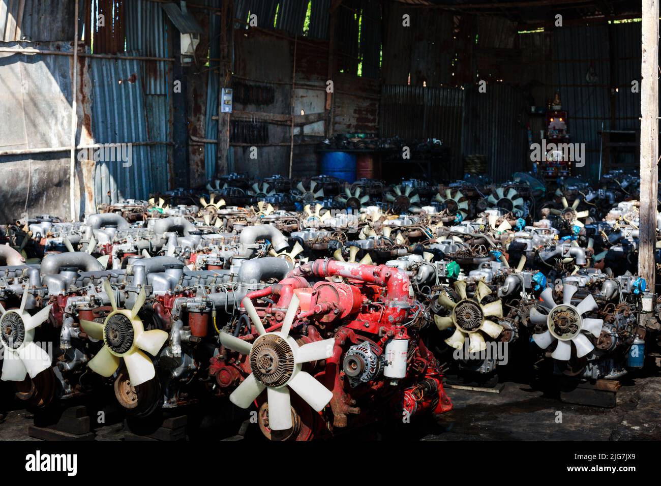 Pallets with used engines in the warehouse of an organization engaged ...