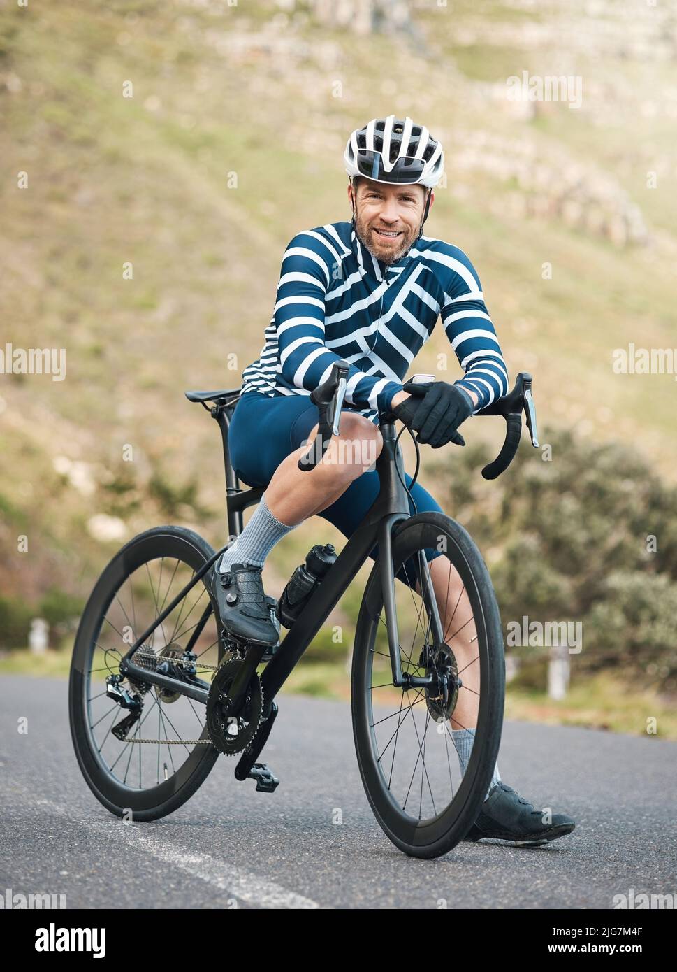 Cycling is my passion. Full length portrait of a handsome mature man ...