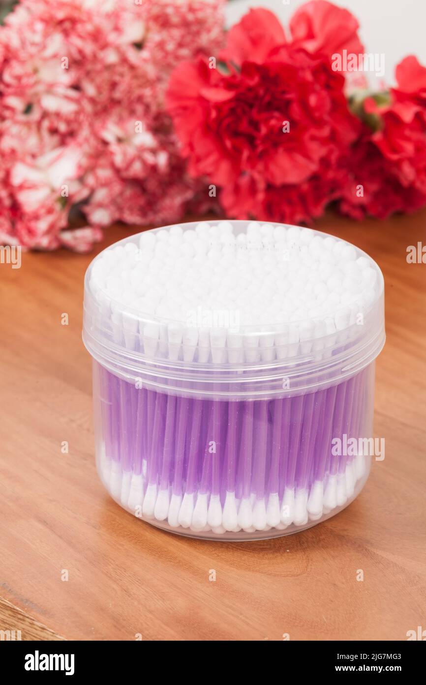 Transparent container with cotton swabs Stock Photo - Alamy