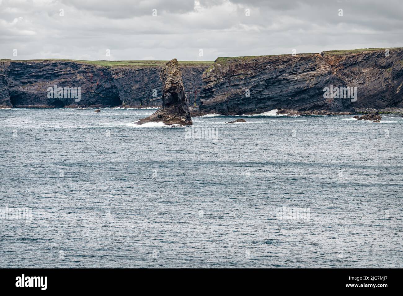 Sea stack and the north coast cliffs of the loophead peninsular in ...