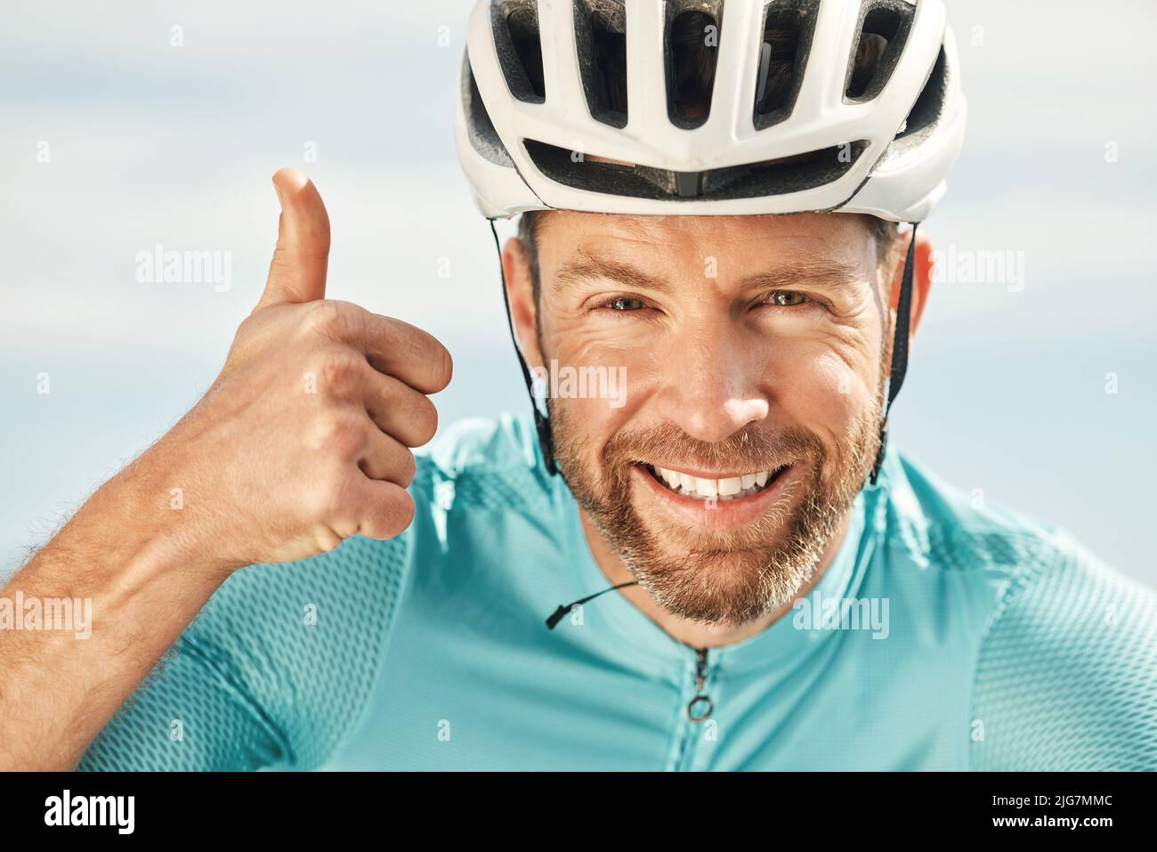 I cant recommend cycling enough. Cropped portrait of a handsome mature ...