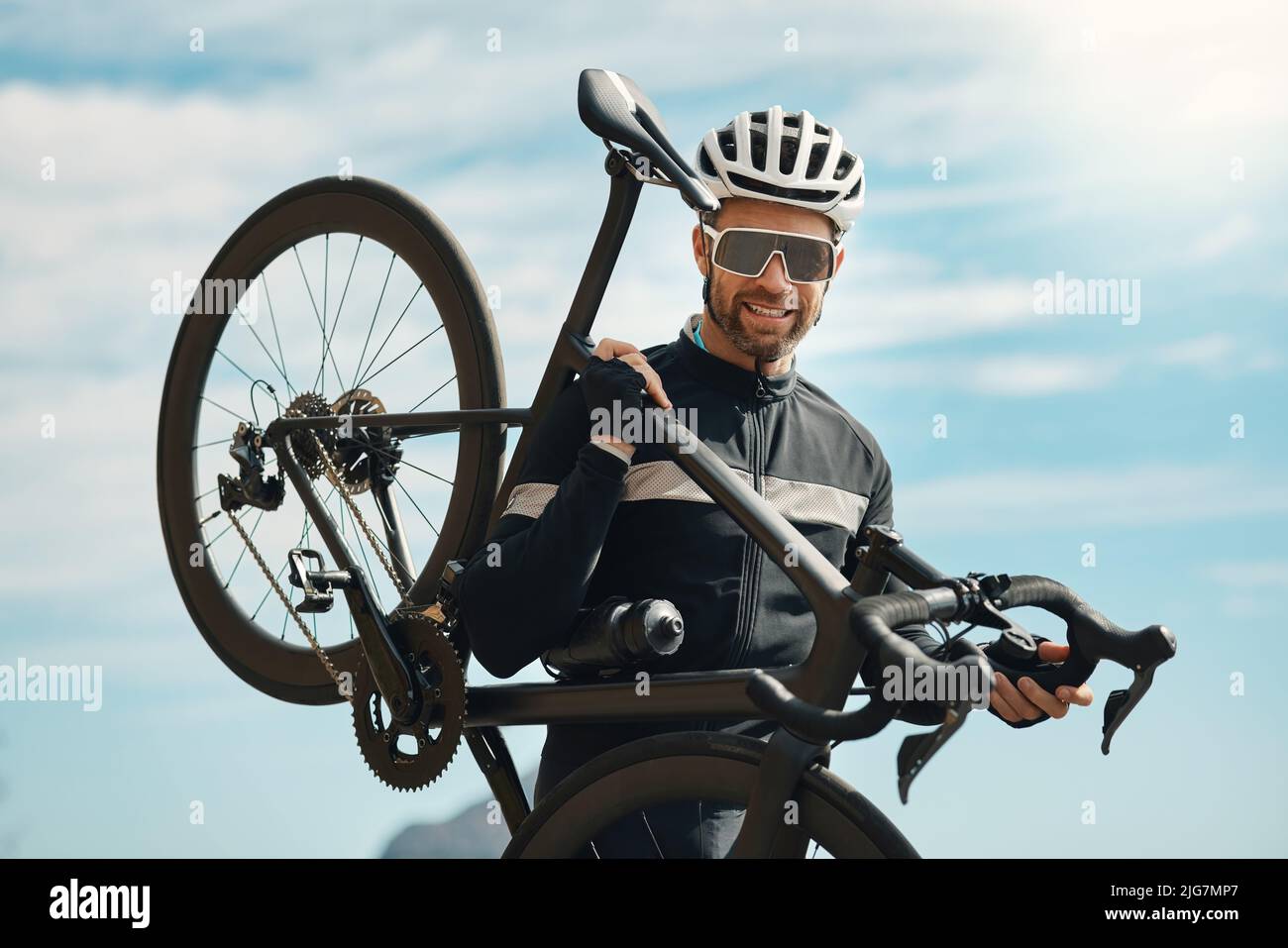 Not all terrain is suitable for cycling. Cropped portrait of a handsome ...
