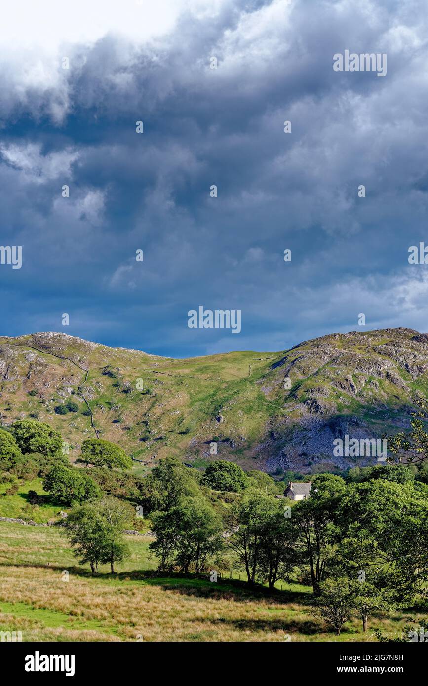 The view from Eskdale Green of Brantrake Crags And Fells on a summers ...