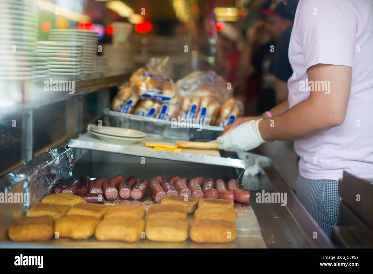 The cook preparing food in the kitchen of restaurant for clients Stock ...