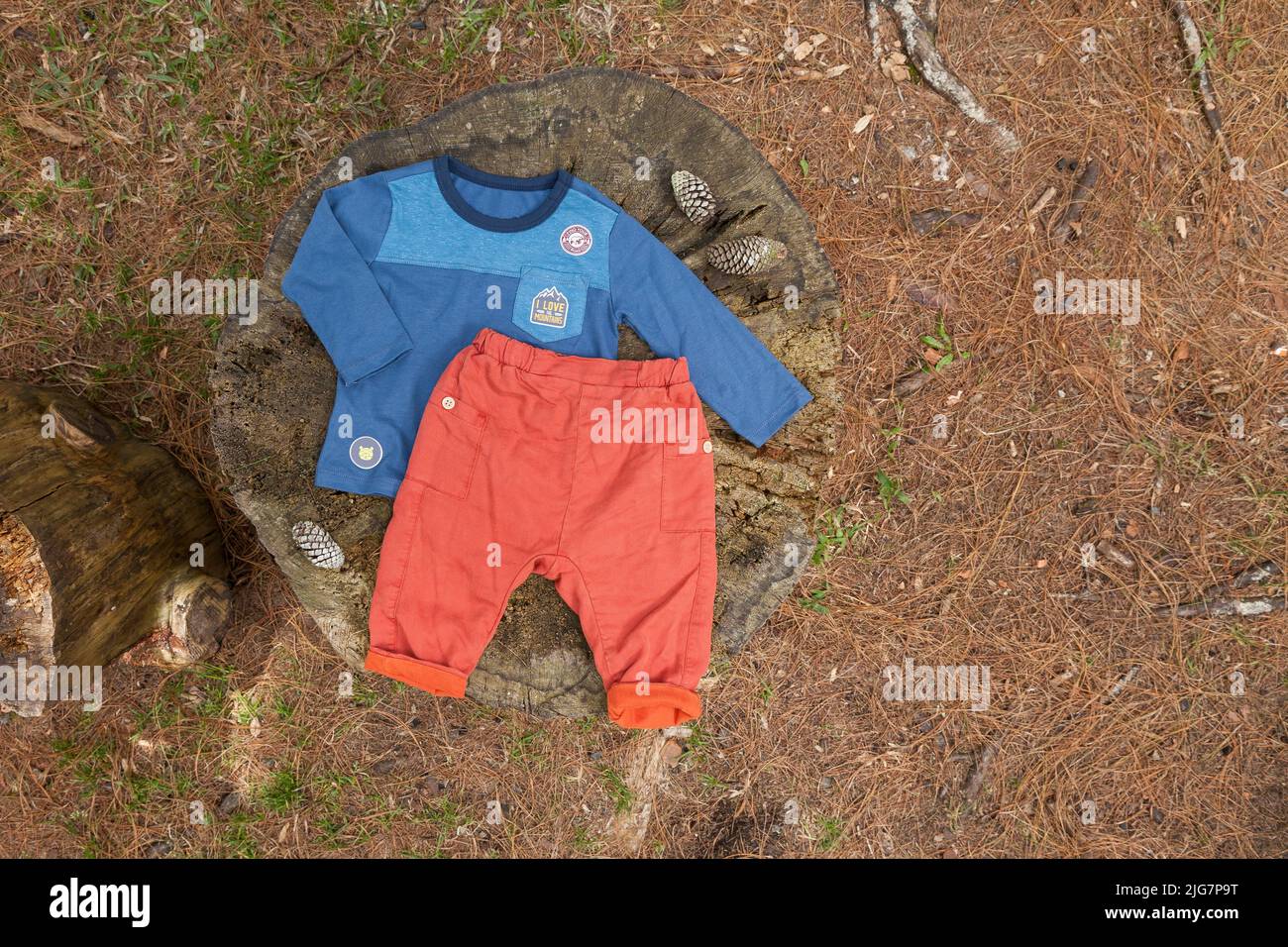 Set of clothes for babies; photos on natural background Stock Photo - Alamy
