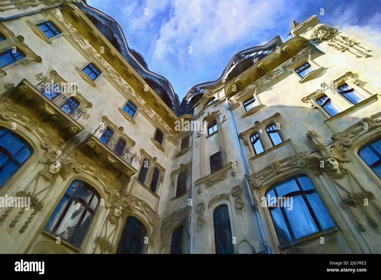 The upper floors of an old building, against the sky. Bottom angle ...