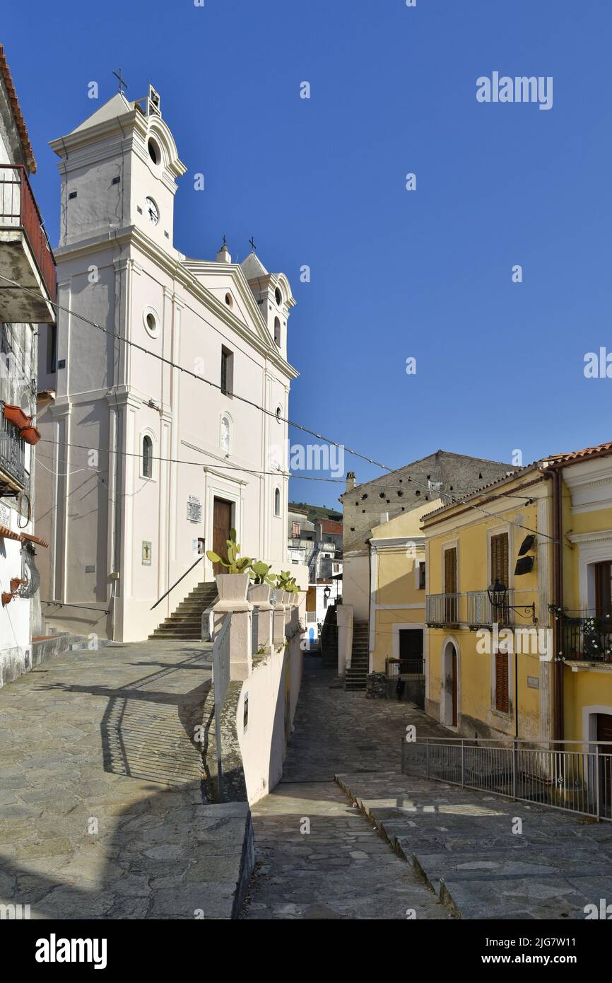 A narrow street with old buildings in San Nicola Arcella, village of ...