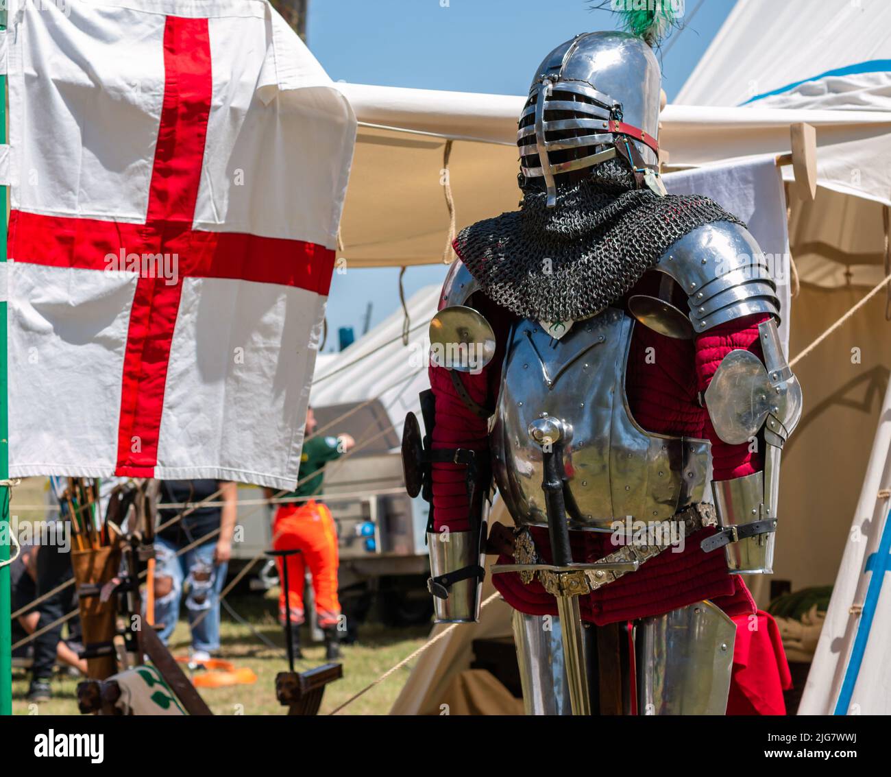 outside a camp tent of a medieval knight plate armor on a mannequin ...