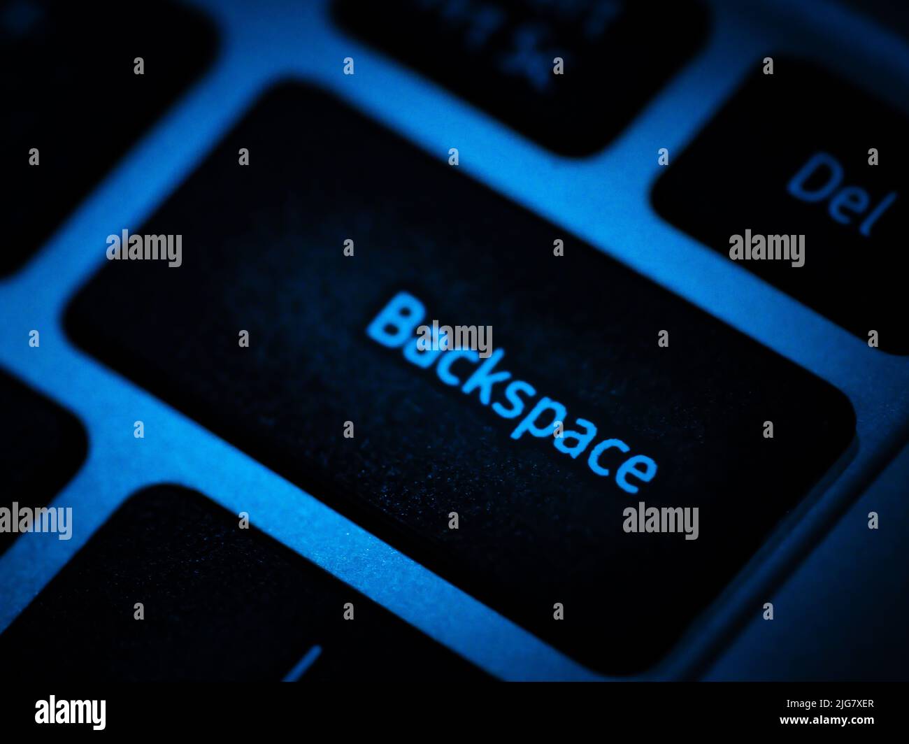 A closeup shot of a backspace icon on a laptop keyboard Stock Photo - Alamy
