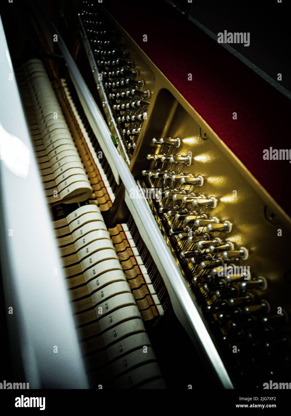A vertical shot of the inner keys of a a piano Stock Photo - Alamy