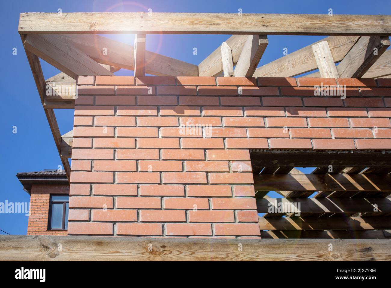 A private residential building under construction with a wooden frame ...