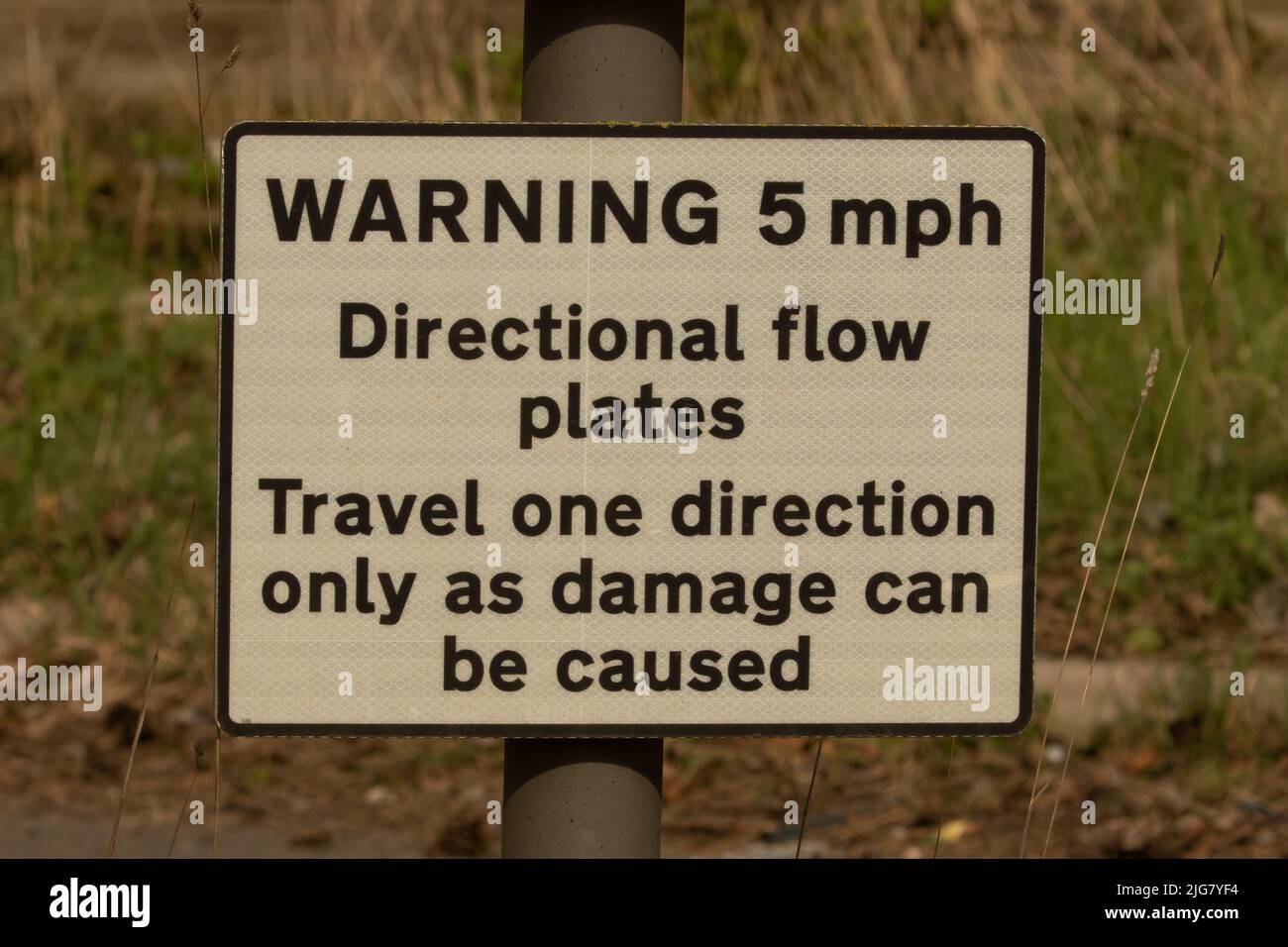 Road sign warning of directional traffic control flow plates in Barnham ...