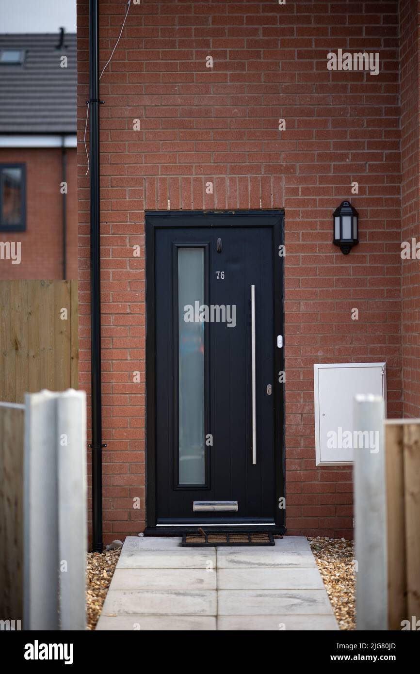 A vertical shot of a modern door of a residential building Stock Photo ...